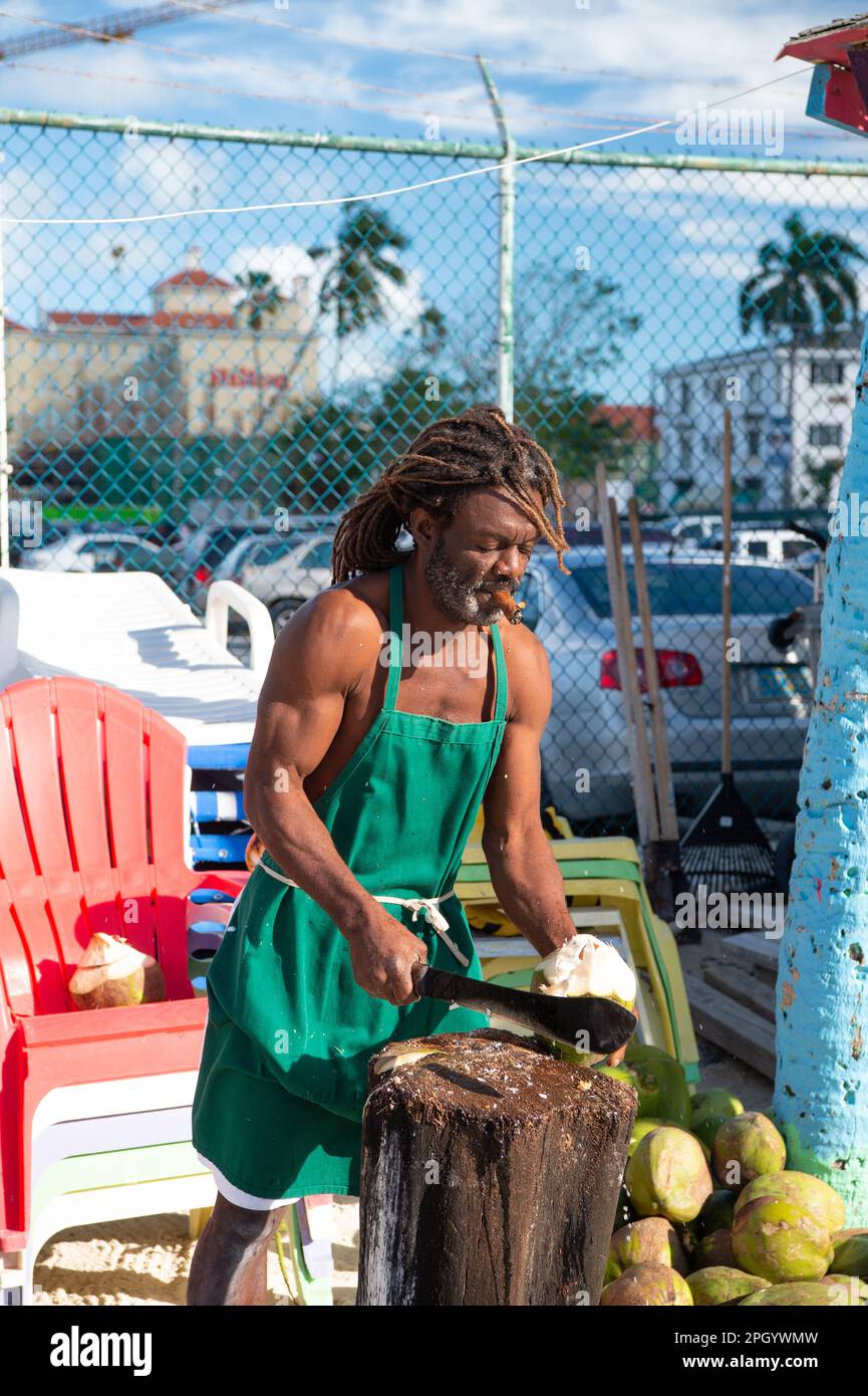 Nassau, Bahamas - January 07, 2016: hawker man with dreadlocks cut ...