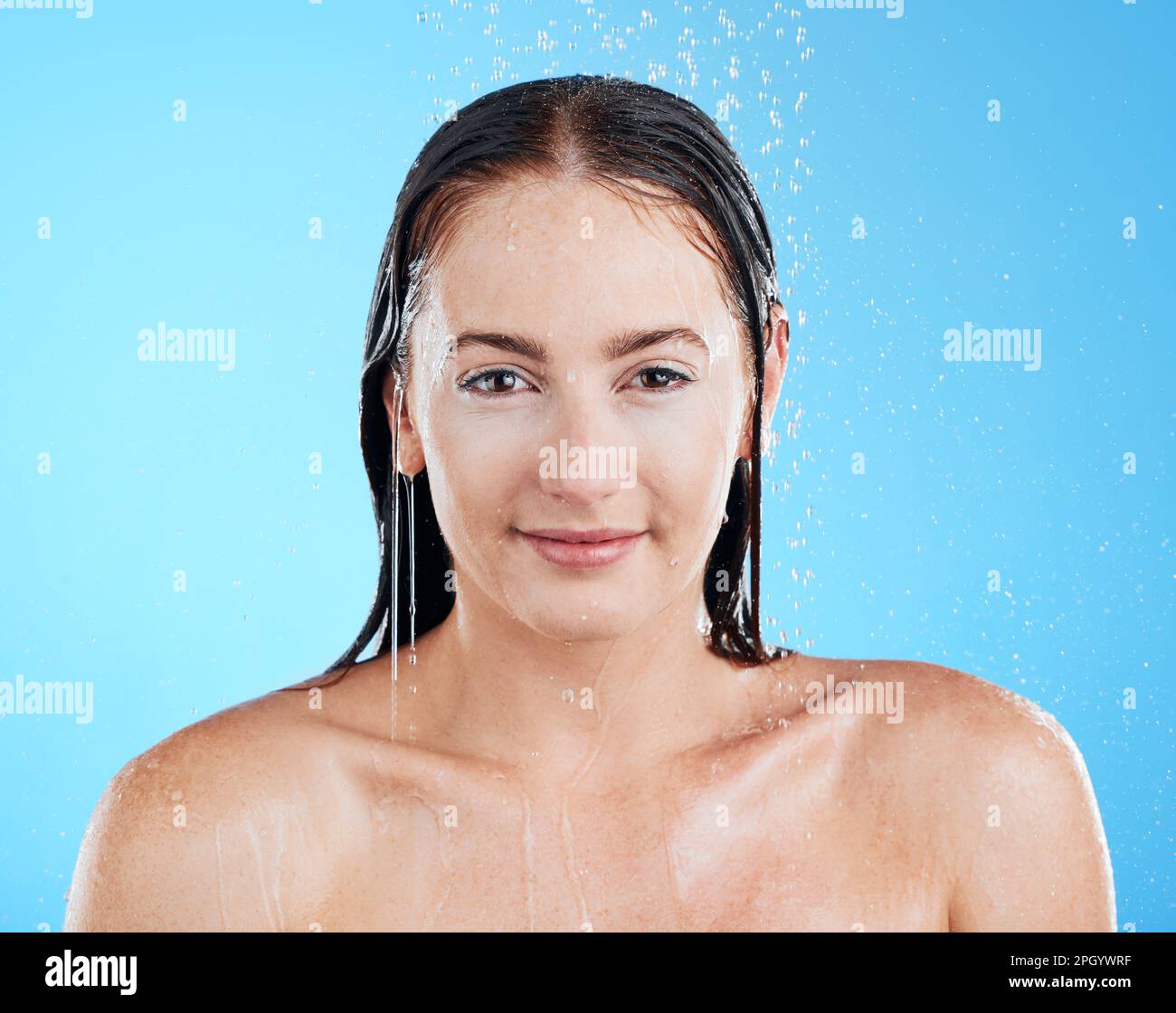 Shower portrait, water and woman in a studio with a smile from cleaning ...
