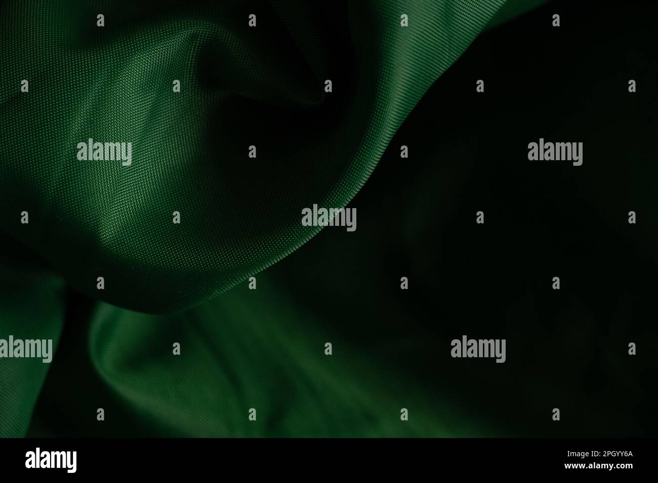 Crumpled dark green silk hi-res stock photography and images - Alamy