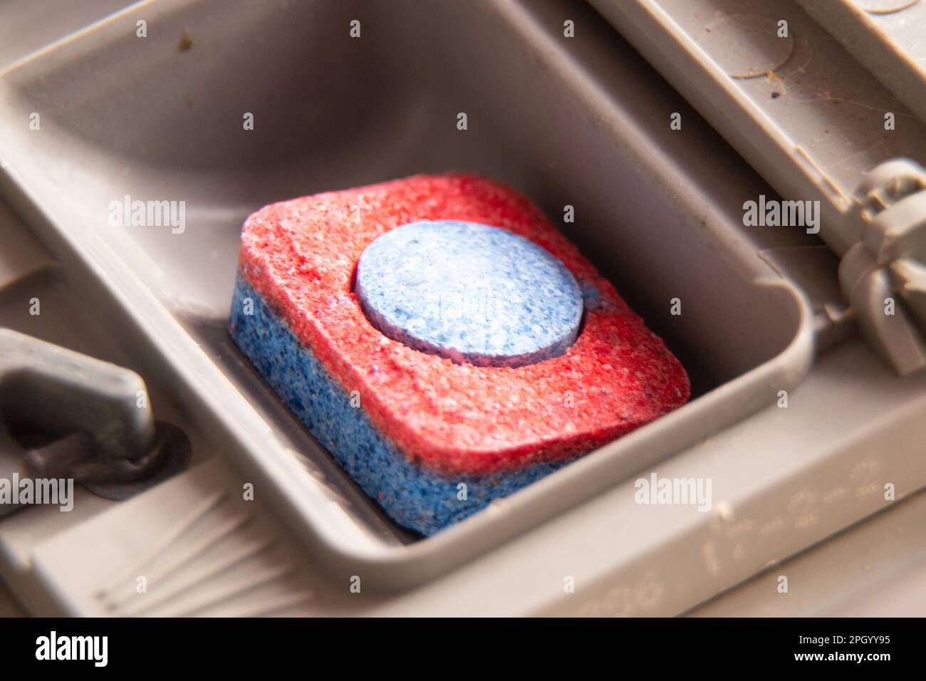 dishwashing tablet is in the dishwasher container, washing dishes Stock ...