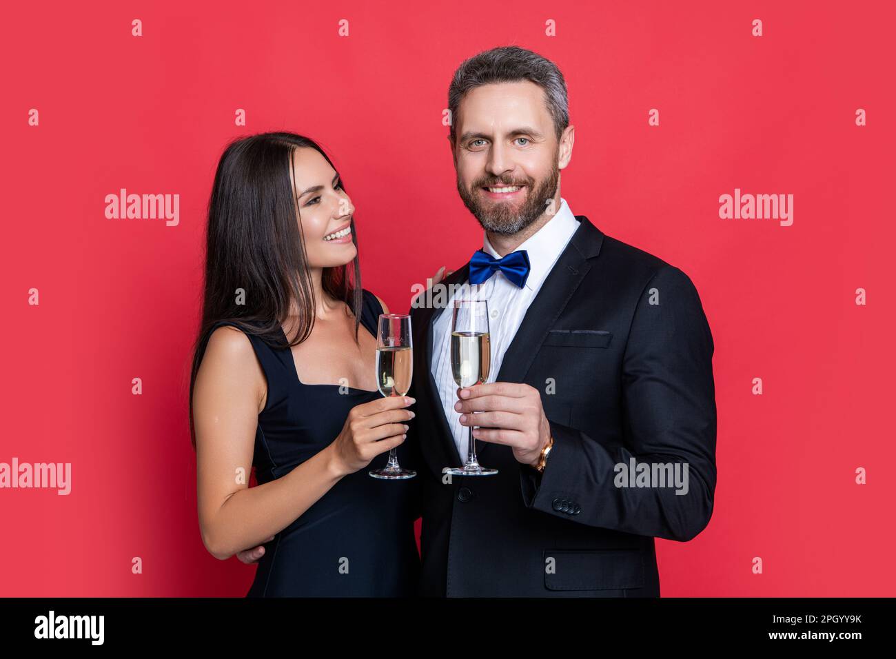 glad couple cheering and celebrate in studio. couple cheering and ...