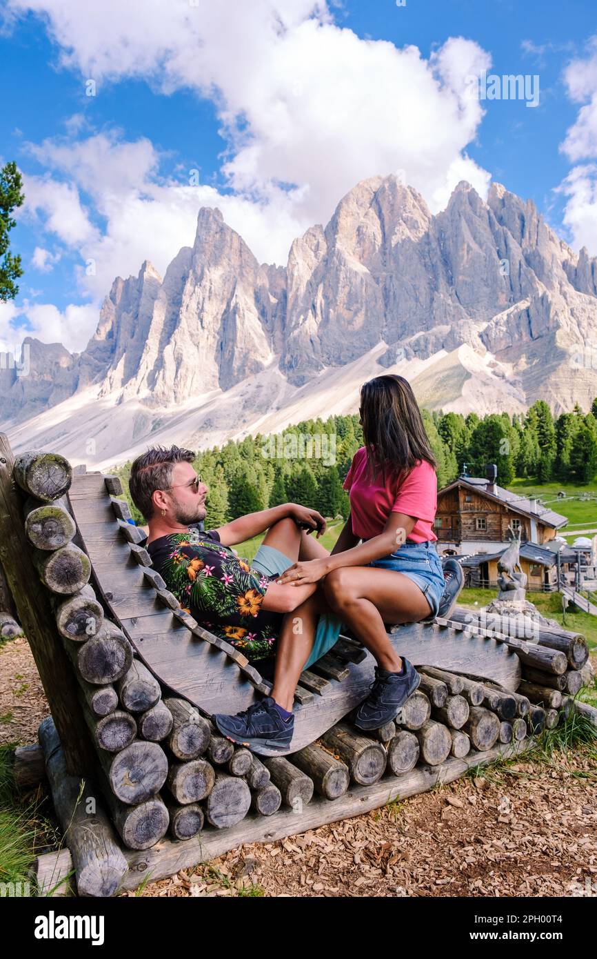Couple men and women at Geisler Alm, Dolomites Italy, hiking in the ...