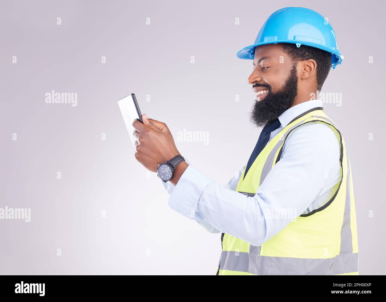Tablet, construction and building with an engineer black man in studio ...
