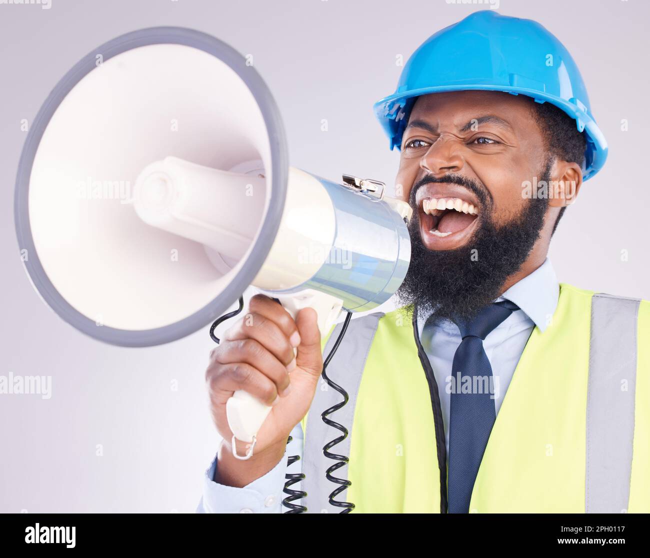 Engineer black man, megaphone and construction in studio portrait for ...