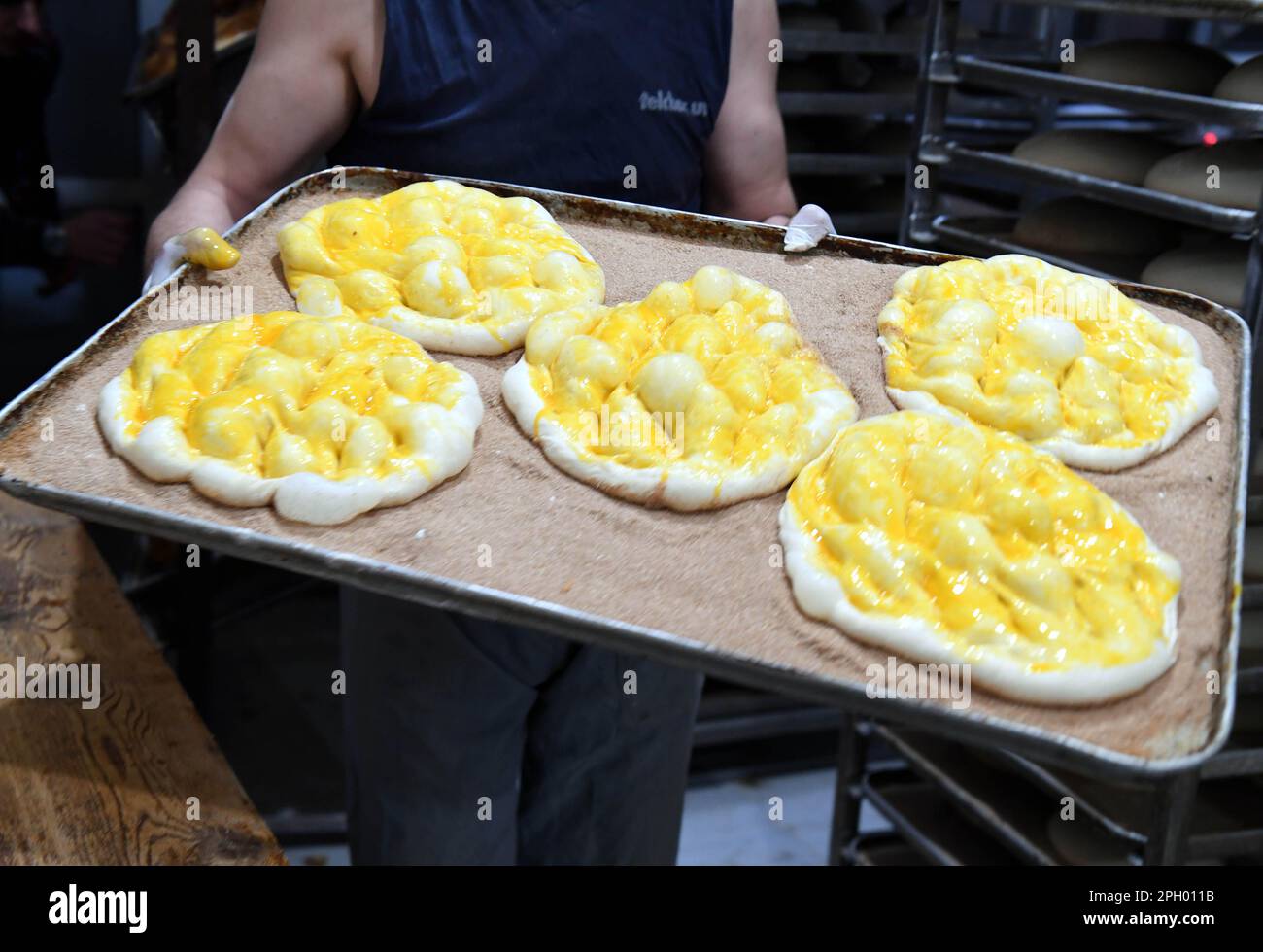 Istanbul, T¨¹rkiye. 23rd Mar, 2023. A baker makes Ramadan Pide at a ...