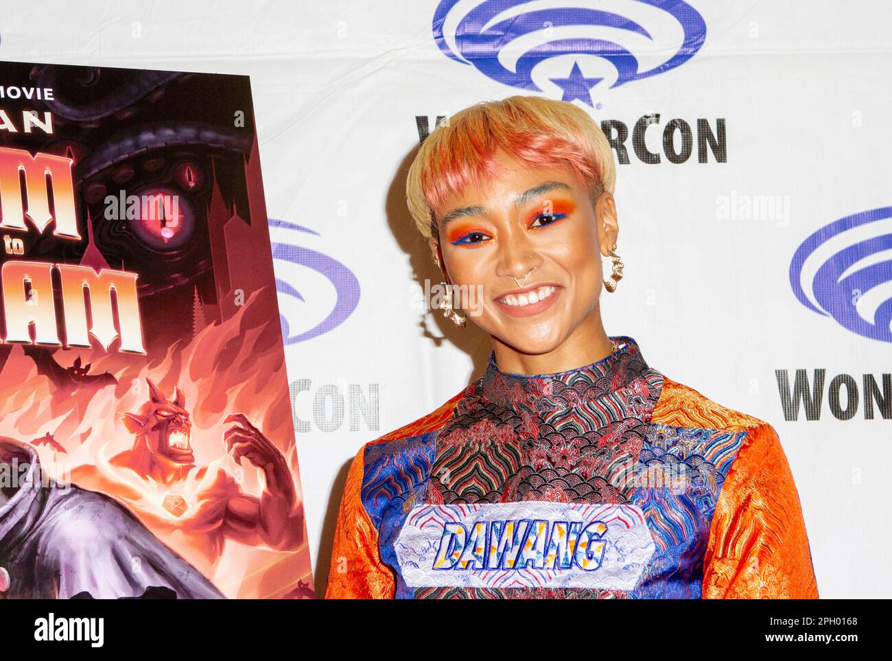 Tati Gabrielle arrives at the press room for "Batman: The Doom That Came To Gotham" during the ...