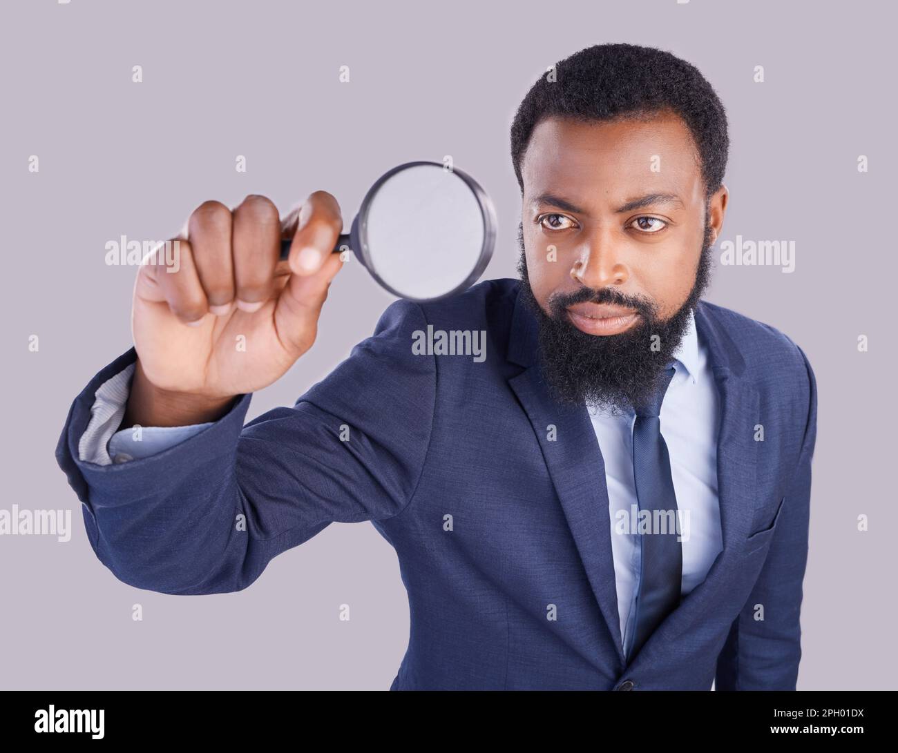 Business black man, magnifying glass and studio with focus for quality ...