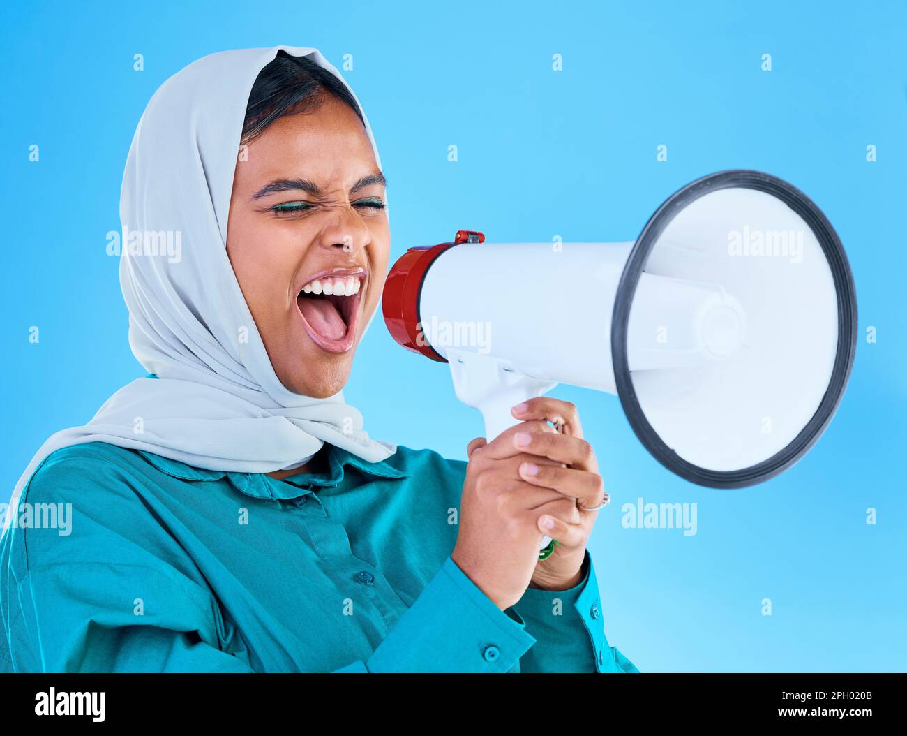 Young woman, muslim and loudspeaker in studio for protest, human rights ...