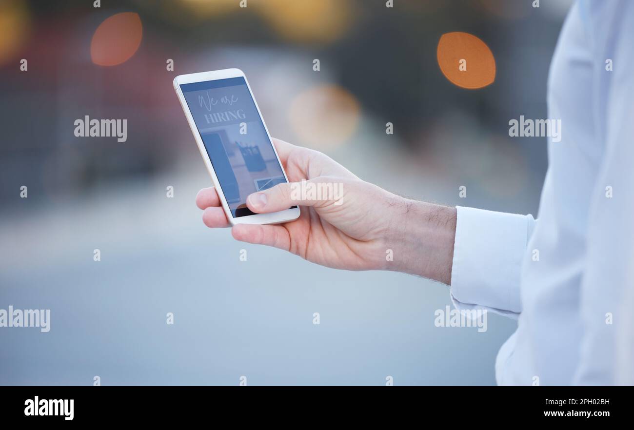 Hand, smartphone screen and city for job, opportunity or search on ...