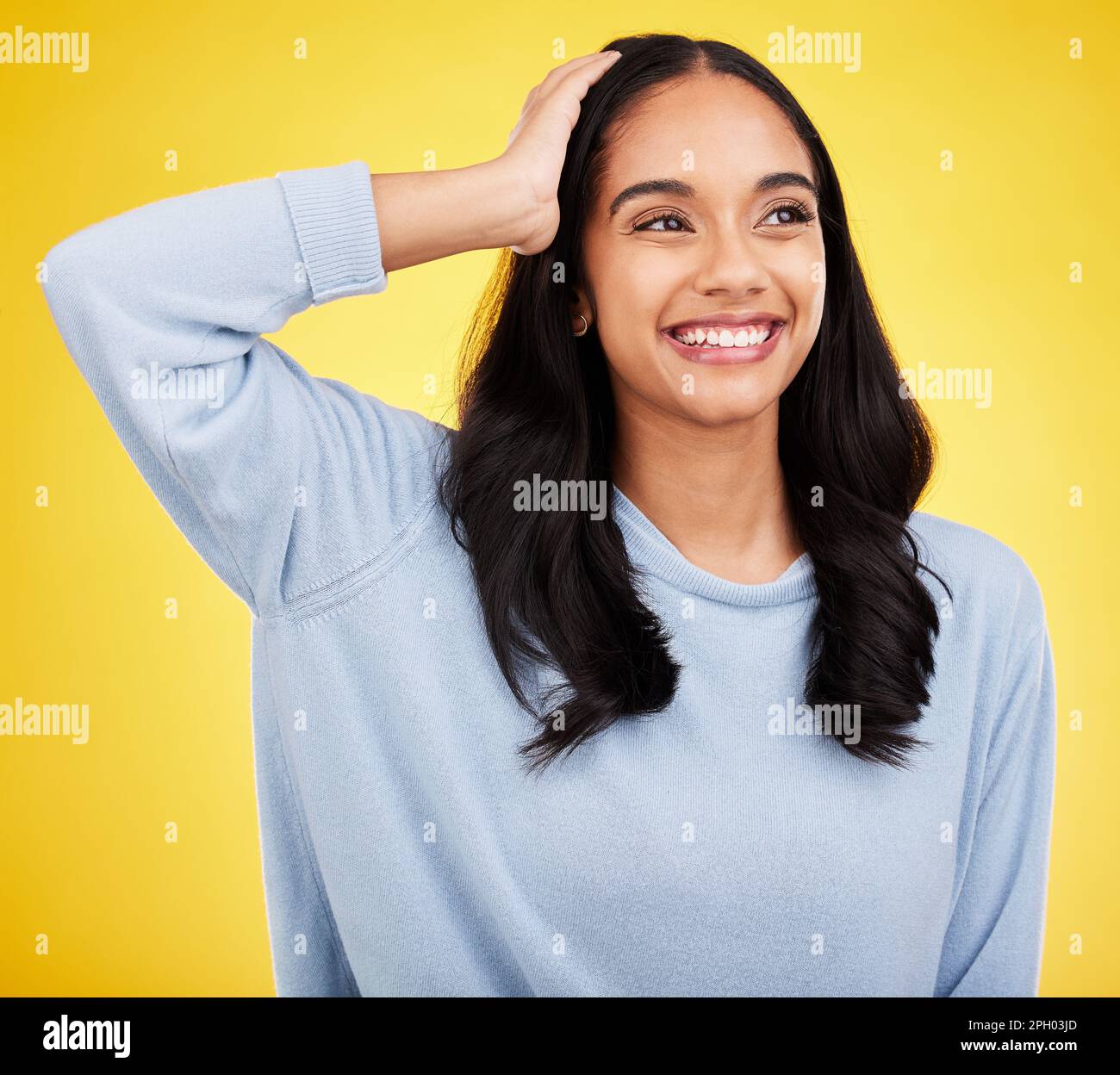 Thinking, smile and a woman on a yellow background in studio ...