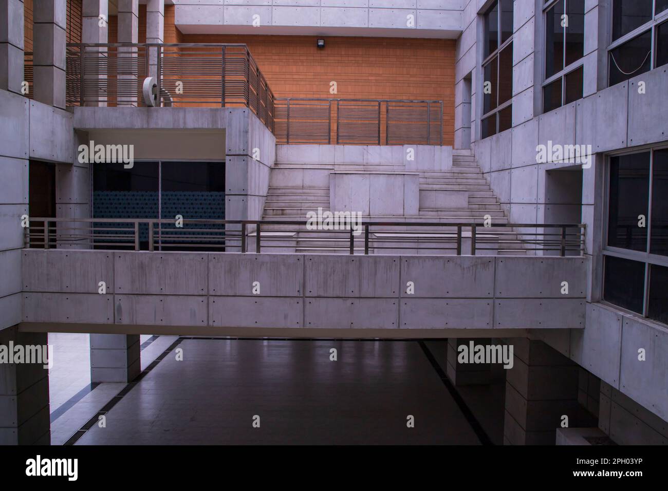 Modern building with stairs and railing in the city center, closeup of ...
