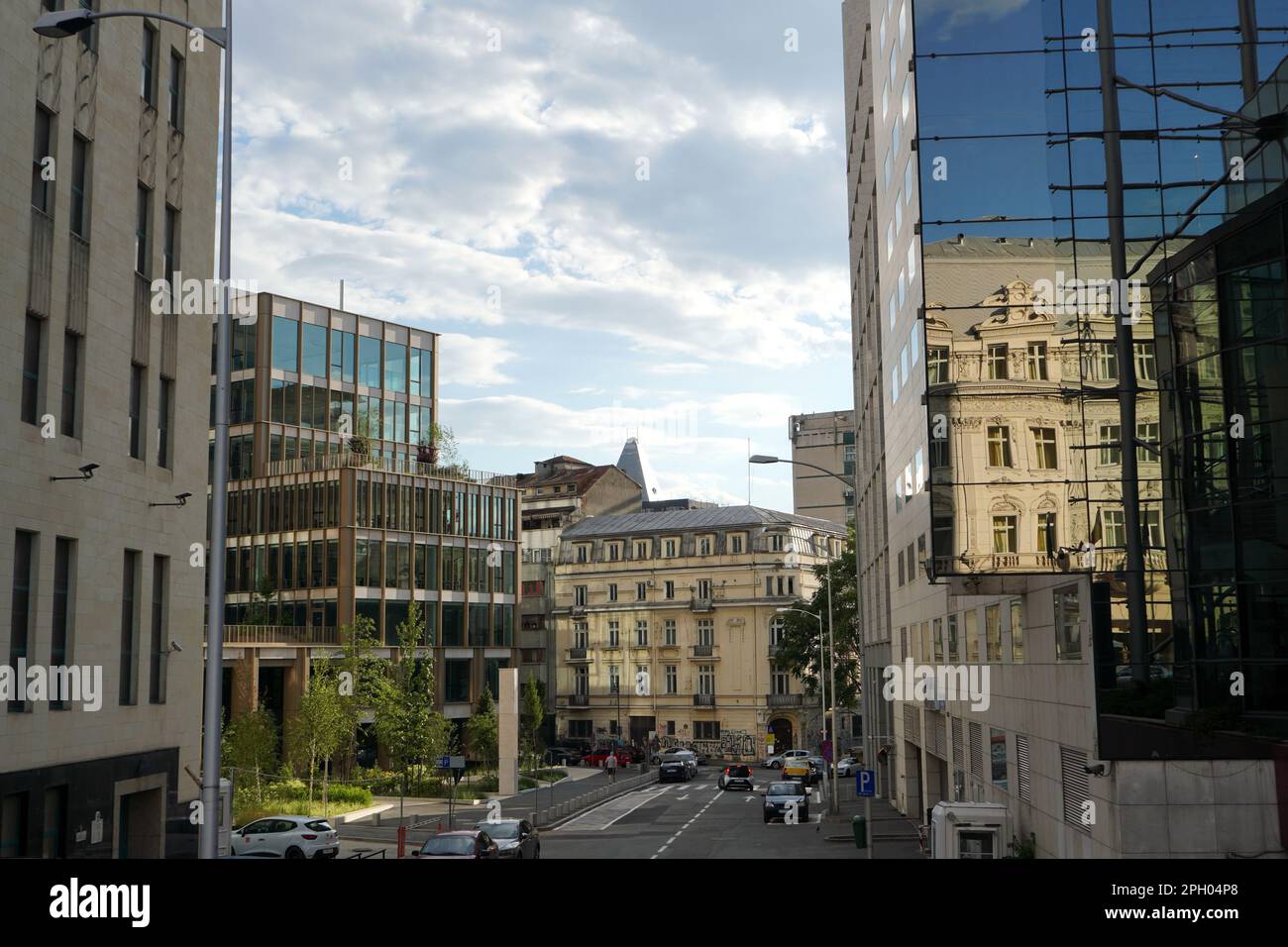 Old and modern architecture residential and office buildings on side ...