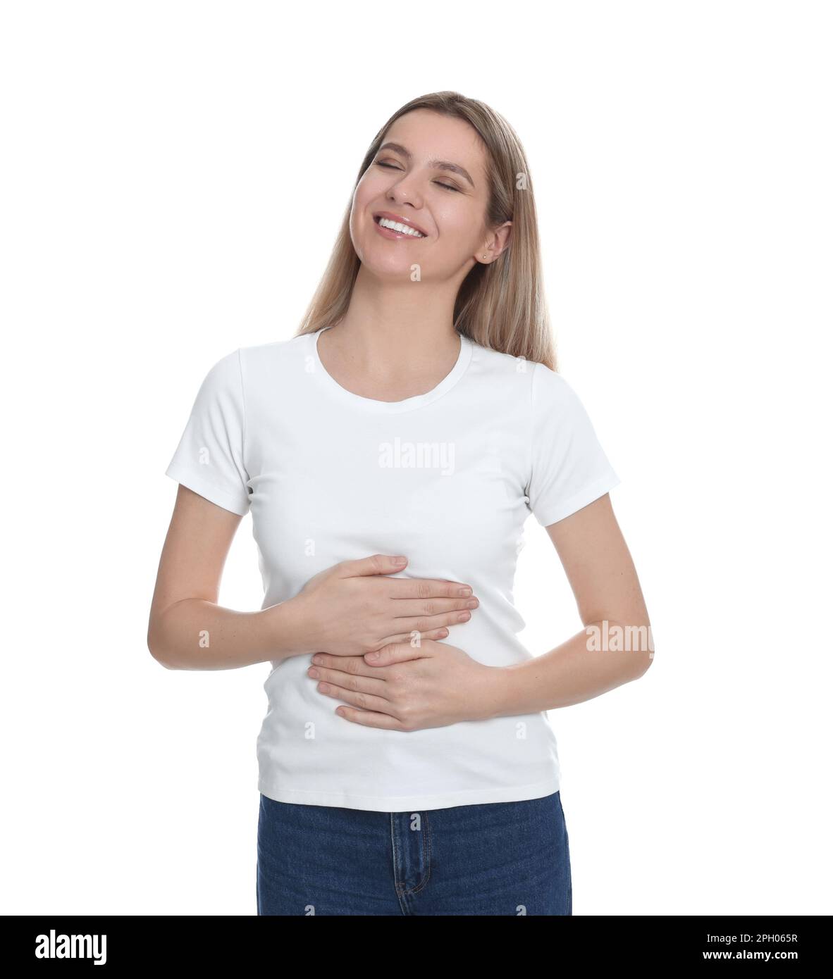 Happy woman touching her belly on white background. Concept of healthy ...
