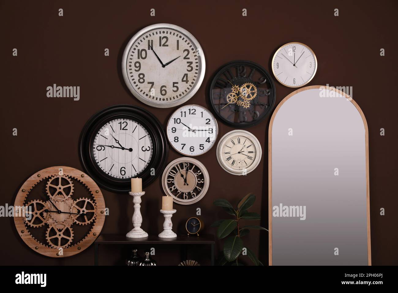 Many various clocks on mirror hi-res stock photography and images - Alamy
