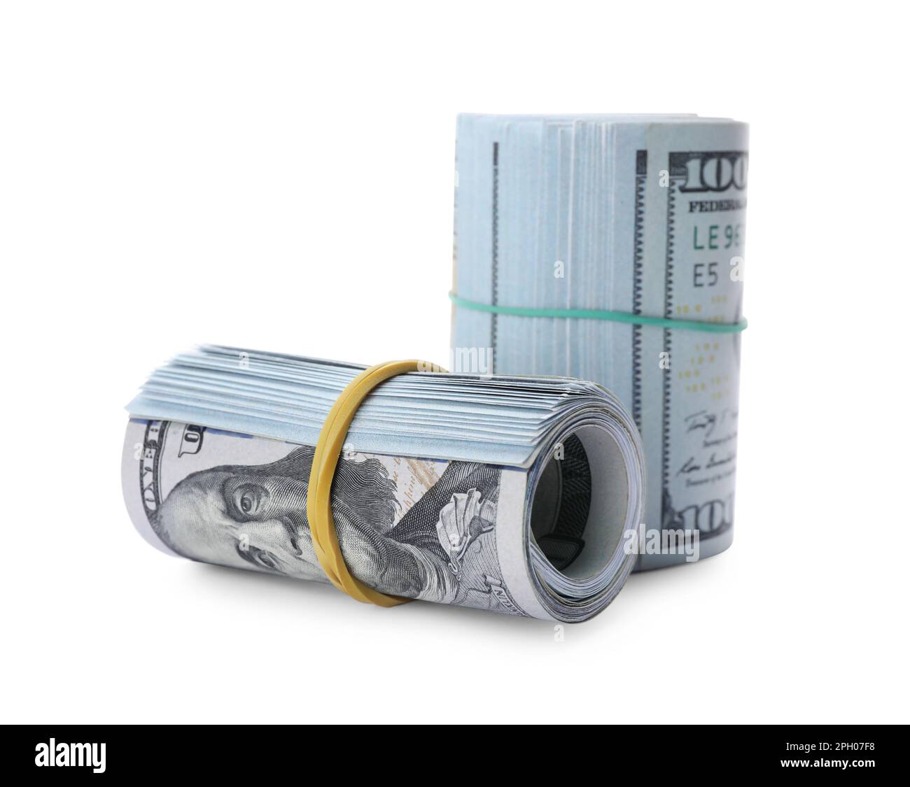Rolled dollar banknotes on white background. American national currency ...