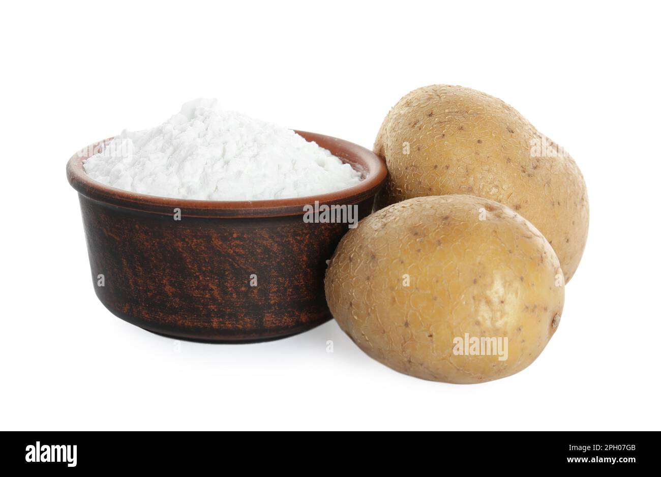 Bowl with starch and fresh potatoes on white background Stock Photo - Alamy