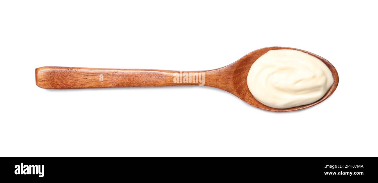 Wooden spoon with mayonnaise isolated on white, top view Stock Photo ...