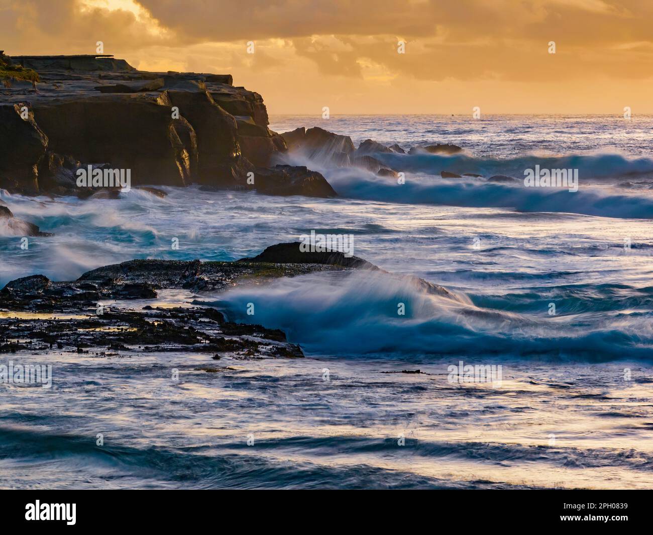 Aerial sunrise seascape with clouds at Spoon Bay in Wamberal on the ...