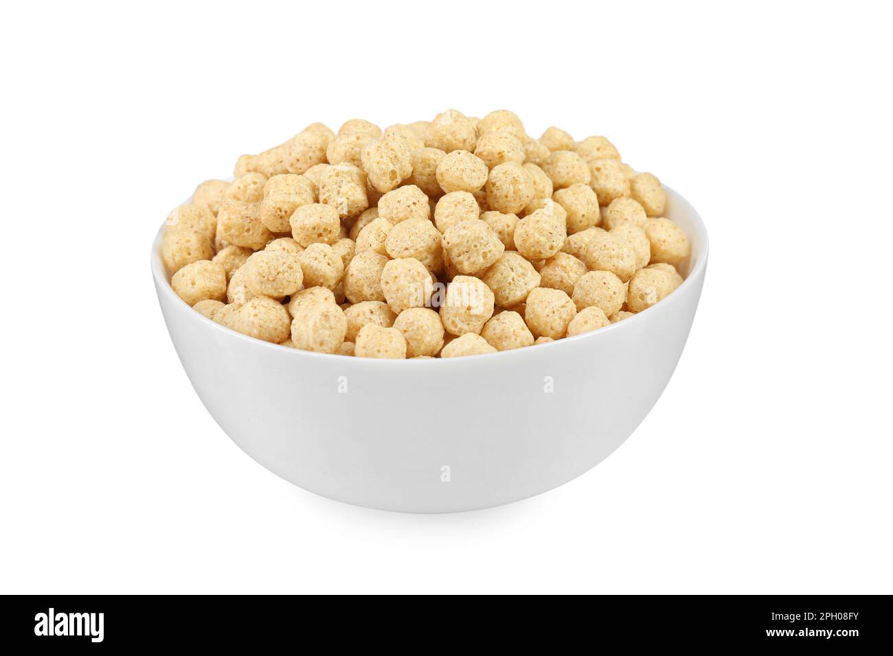 Bowl of sweet crispy corn balls on white background. Breakfast cereal ...