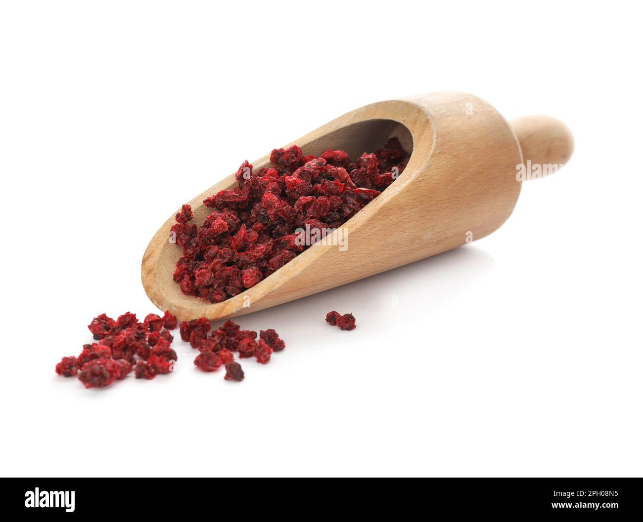 Dried red currants and wooden scoop on white background Stock Photo - Alamy