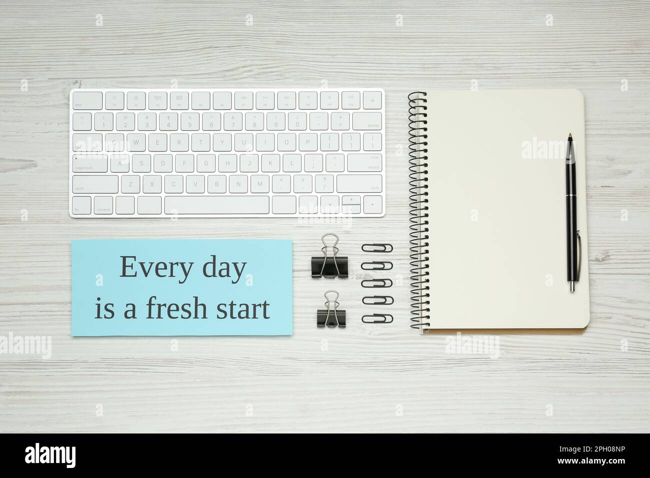 Note with motivational quote Every day is a fresh start, computer ...