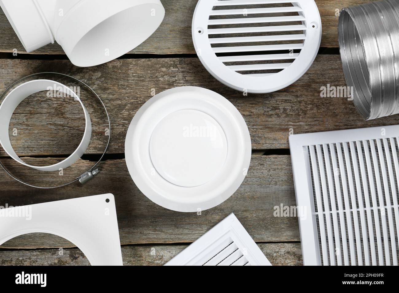 Parts of home ventilation system on wooden surface, flat lay Stock ...