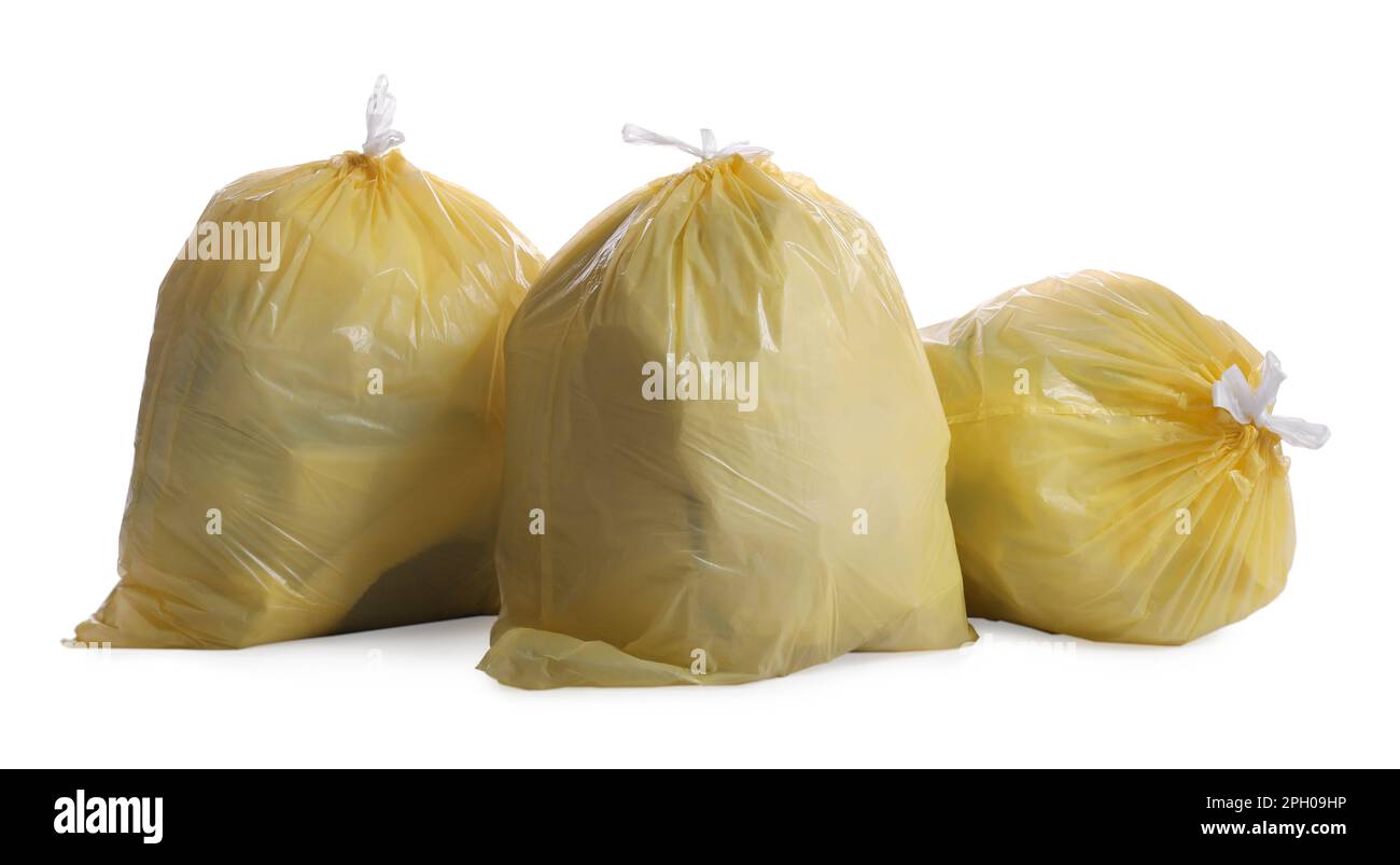 Trash bags full of garbage on white background Stock Photo - Alamy