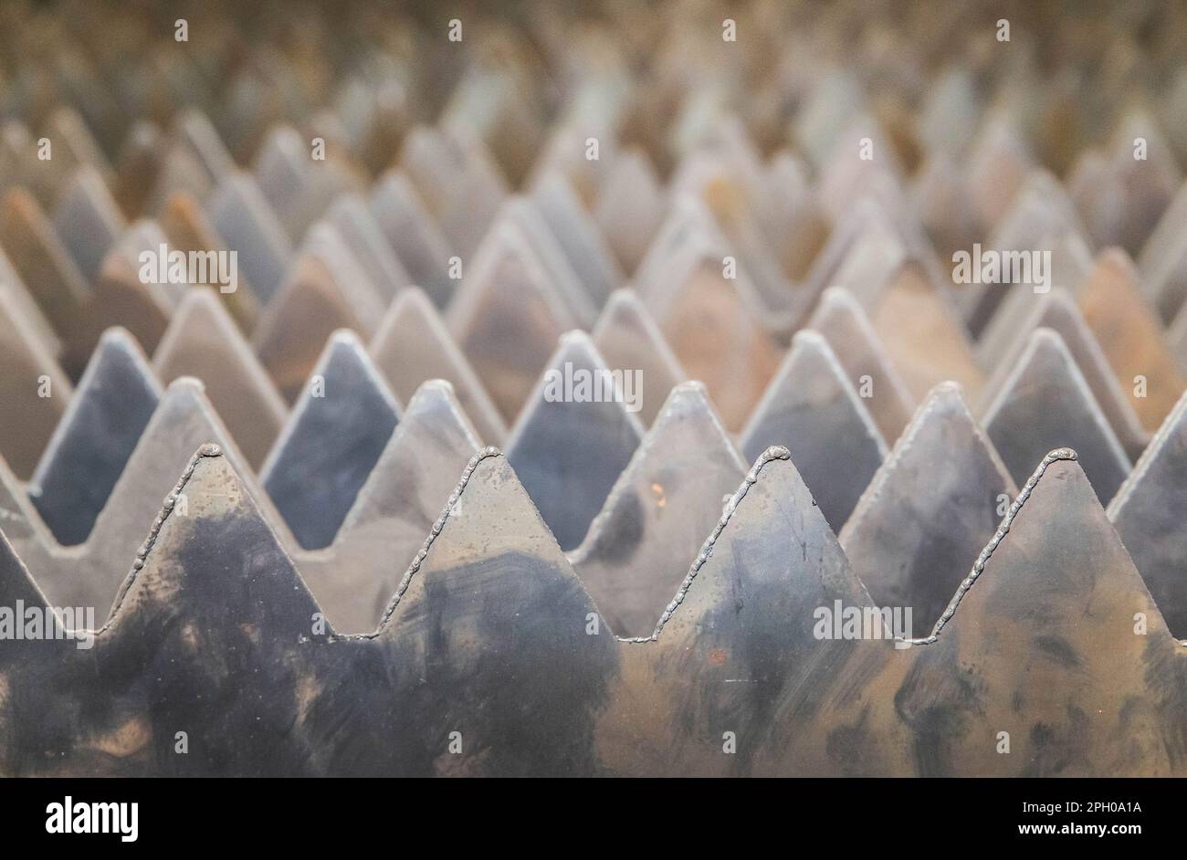 background of metal plates similar to teeth Stock Photo - Alamy