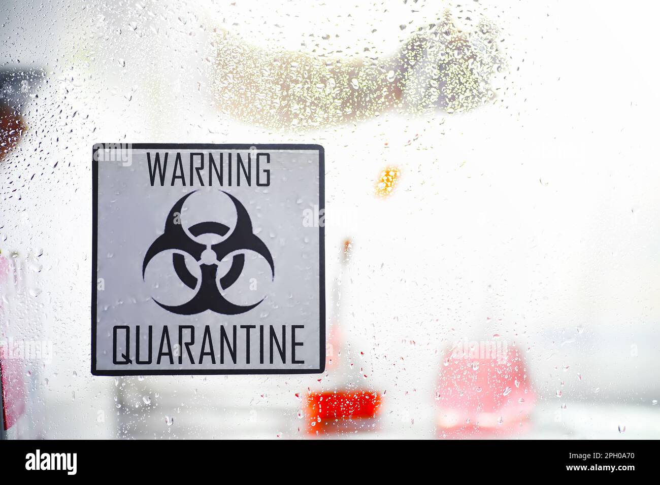 Quarantine. Quarantine warning sign on a glass door in hospital ...