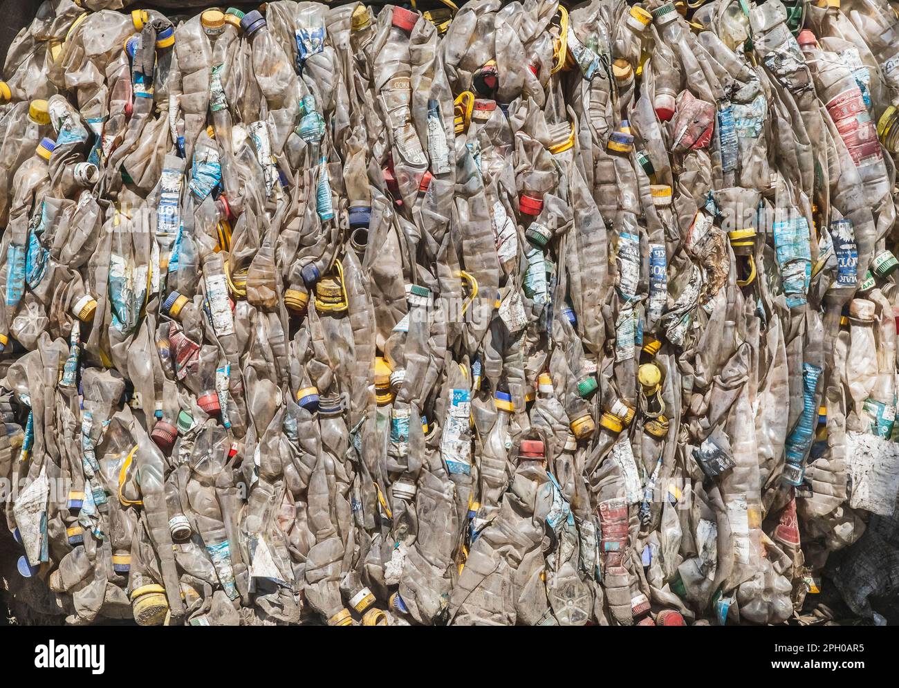 background of pressed plastic bottles to be recycled Stock Photo - Alamy