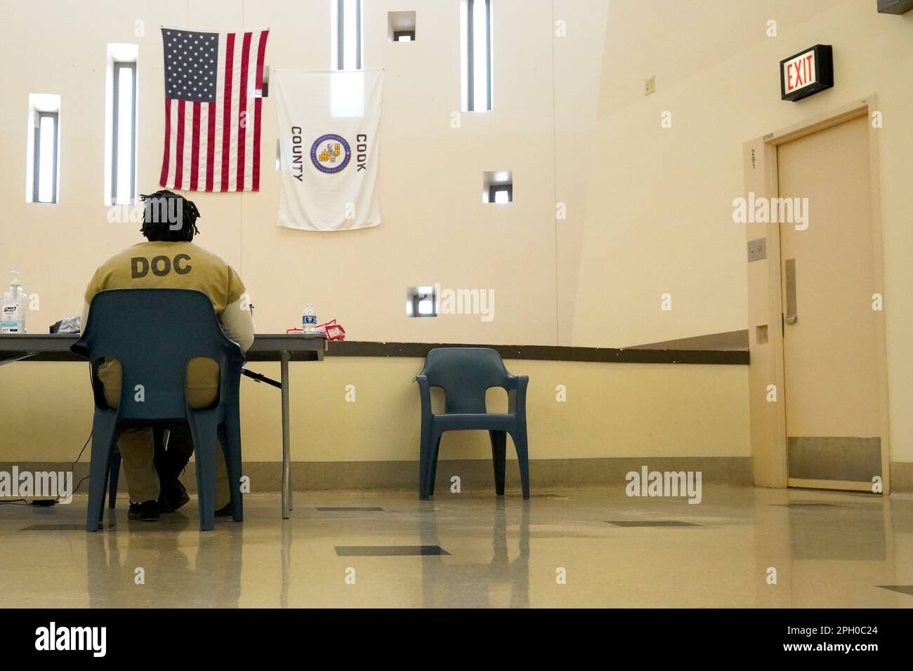 Tykarri Skillon, an inmate at the Cook County, Ill., jail sits to ...