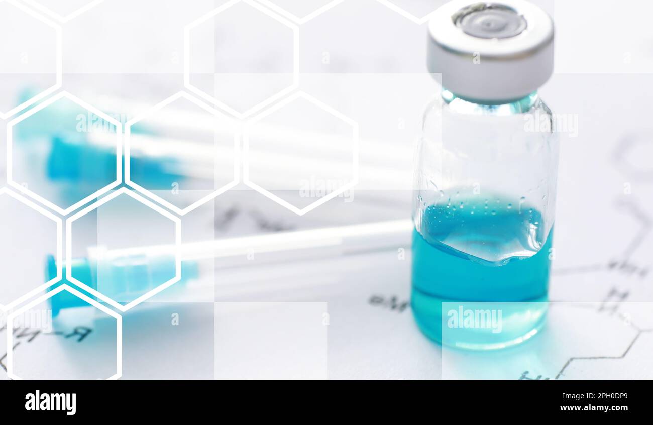 small jars with injection and syringe for injection on blue background ...