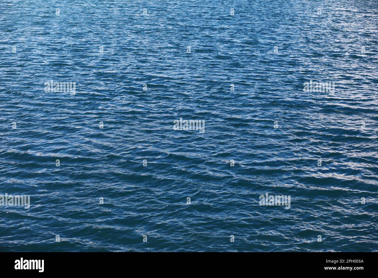 Water surface. The texture of the water. Waves on the lake windy ...