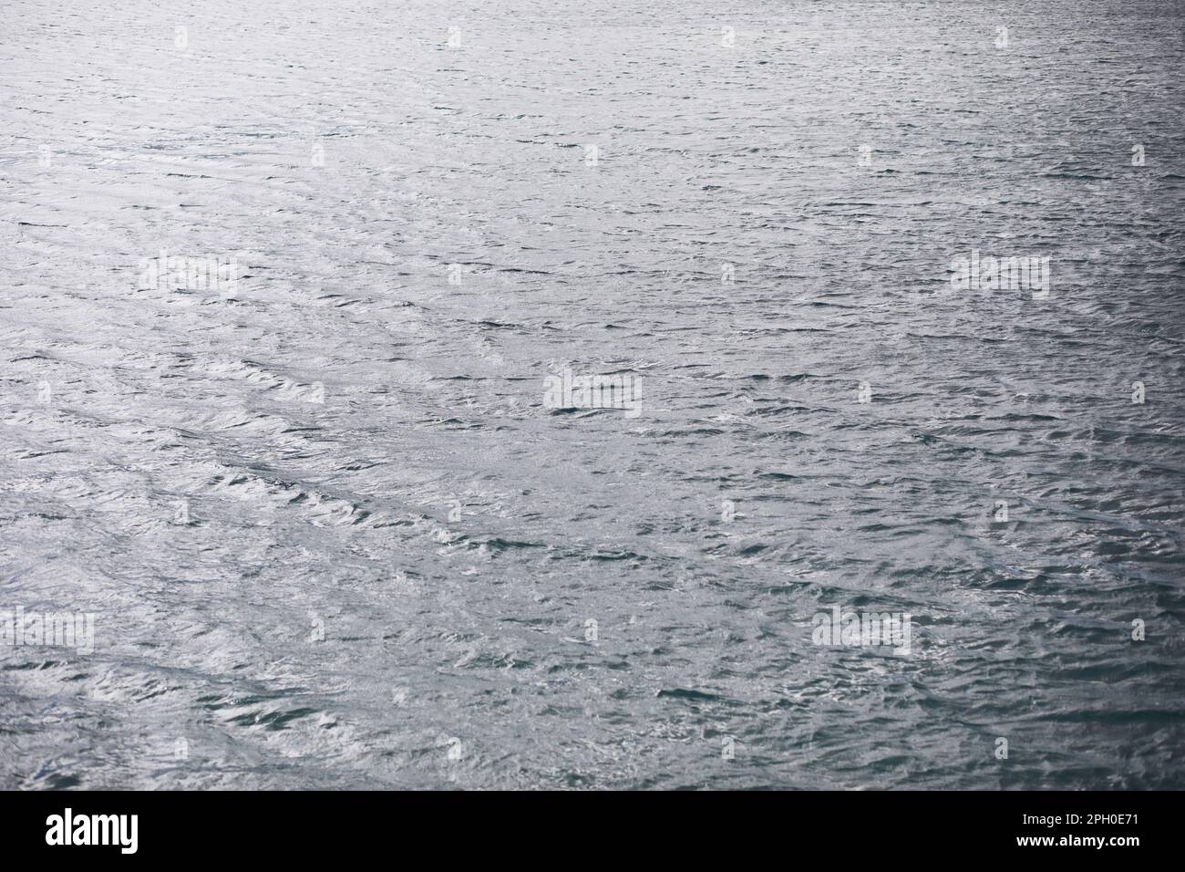 Water surface. The texture of the water. Waves on the lake windy ...