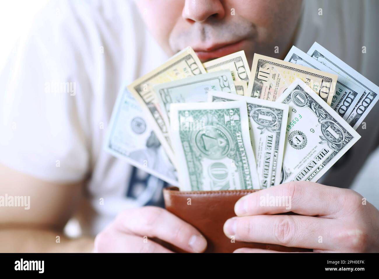 Cash money in a large pile as a finance background. Paper money close ...