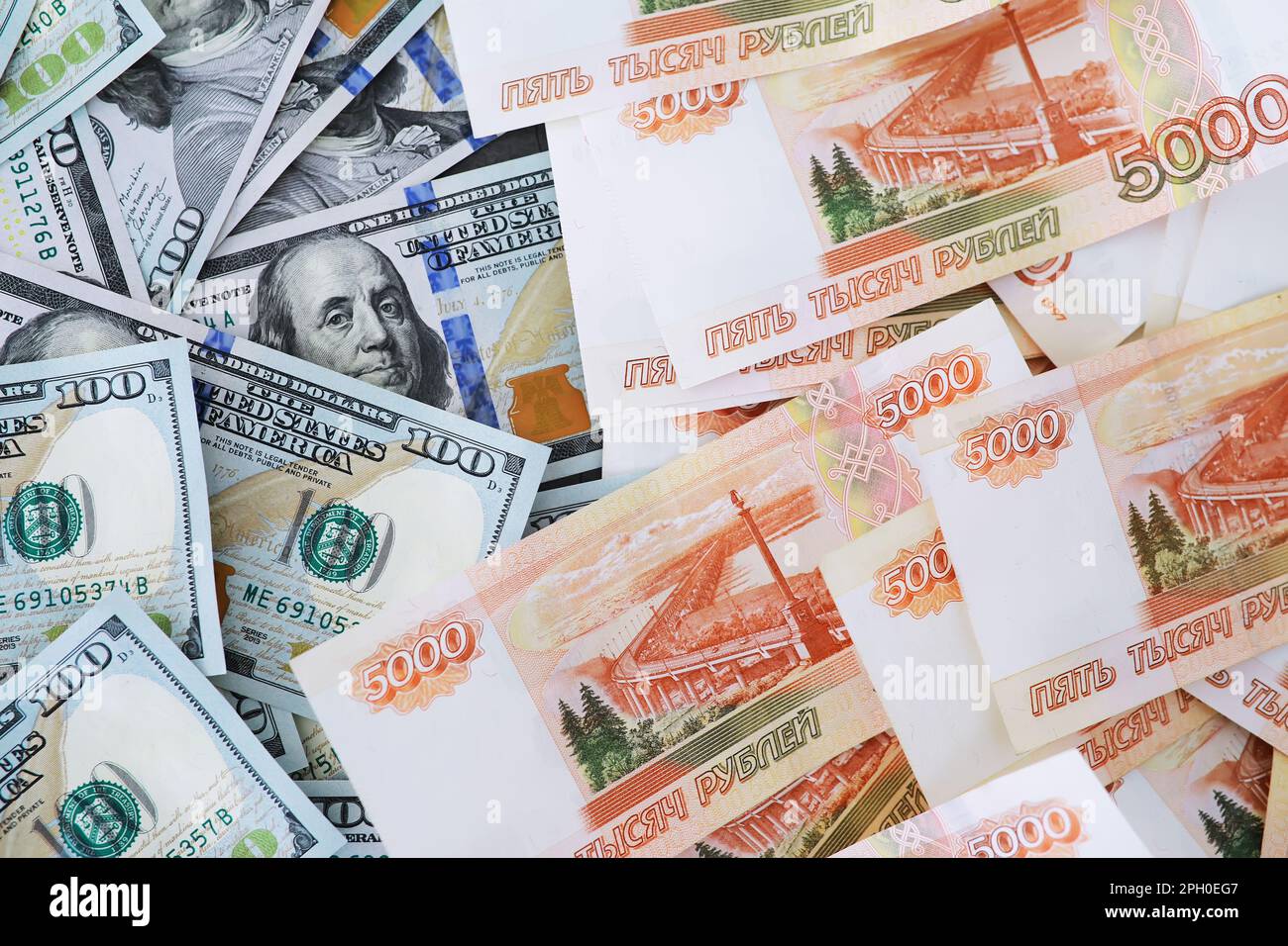Cash money in a large pile as a finance background. Paper money close ...