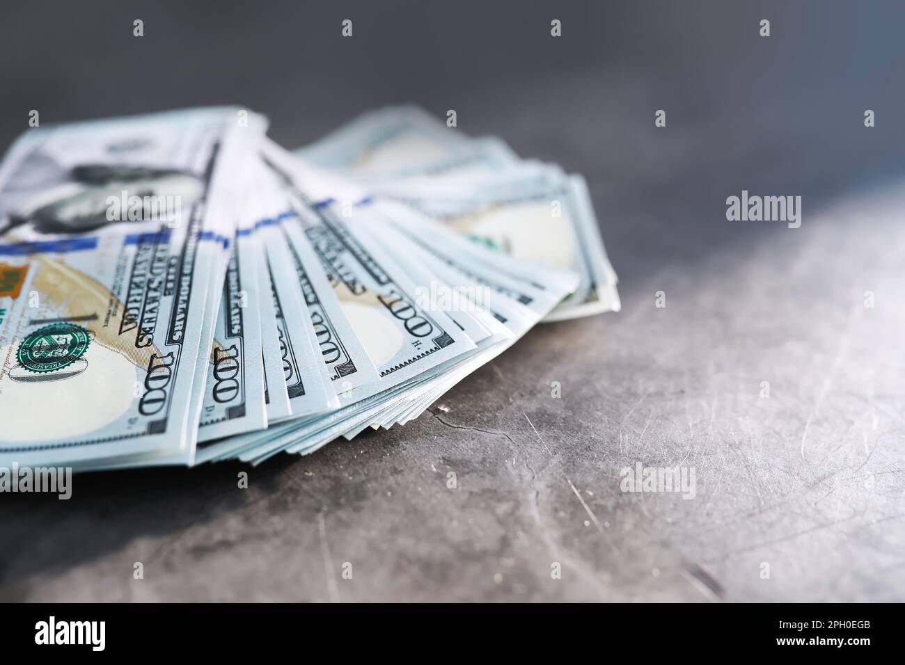 Cash money in a large pile as a finance background. Paper money close ...