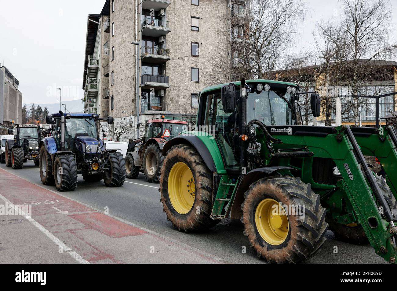 Farmers drive their tractors through the city during an agricultural ...