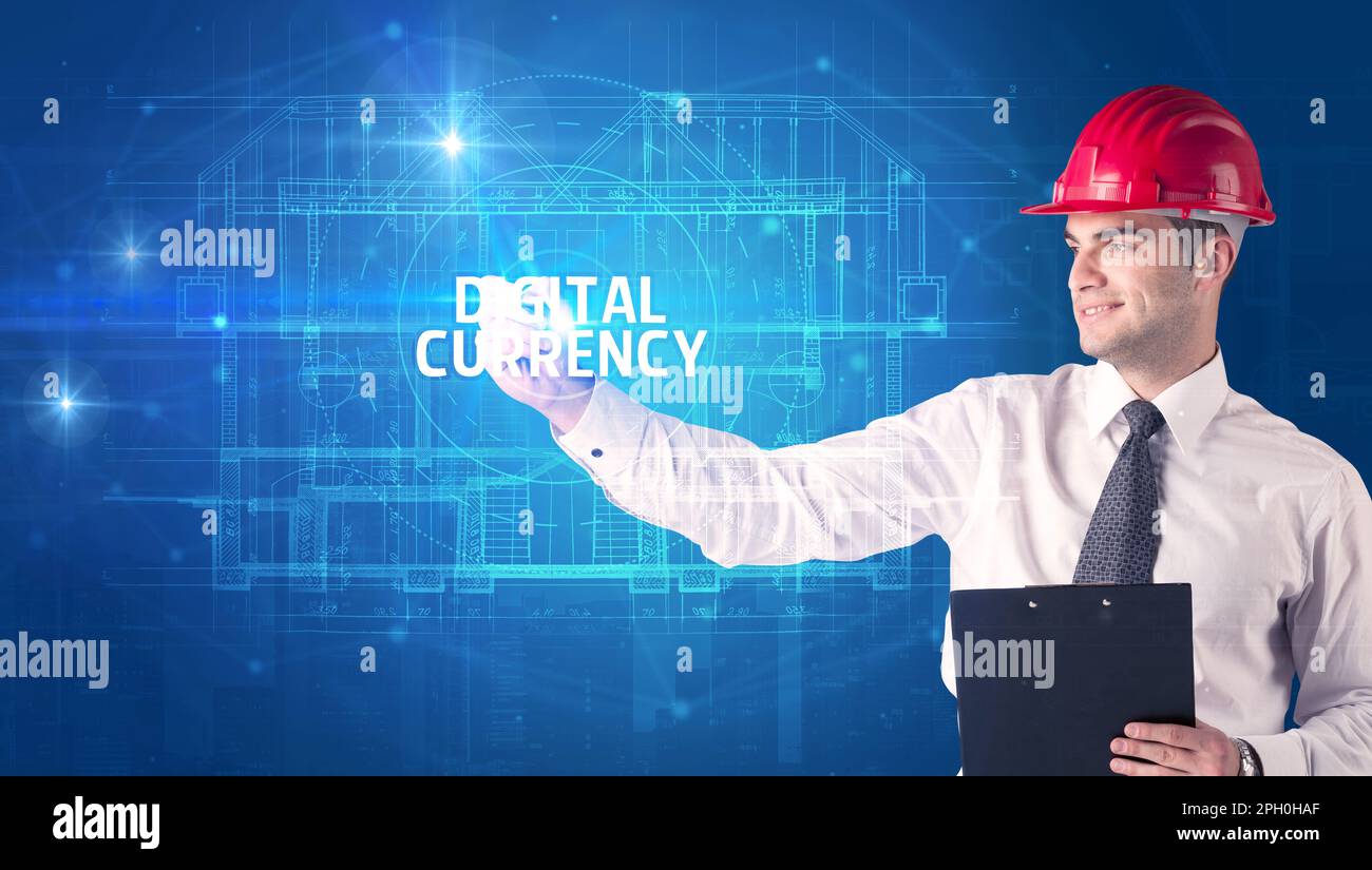 Handsome architect drawing with helmet Stock Photo - Alamy