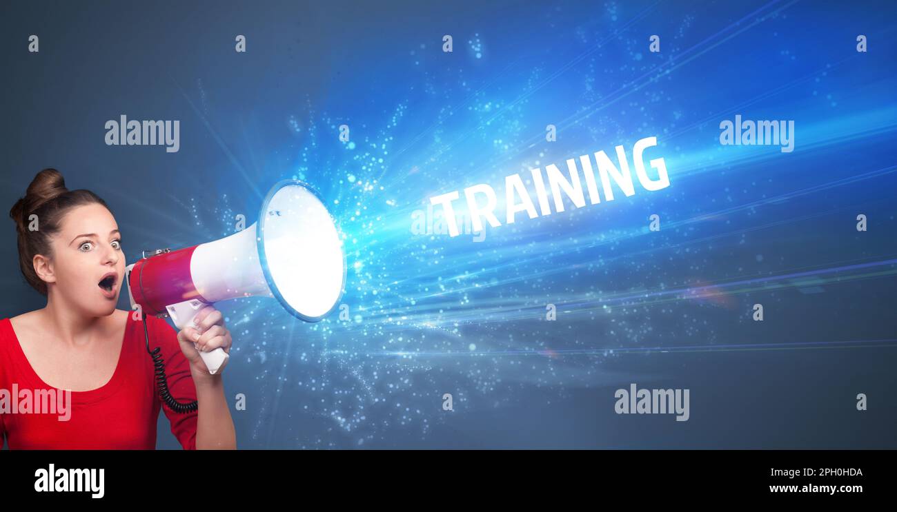 Young person shouting in loudspeaker Stock Photo - Alamy