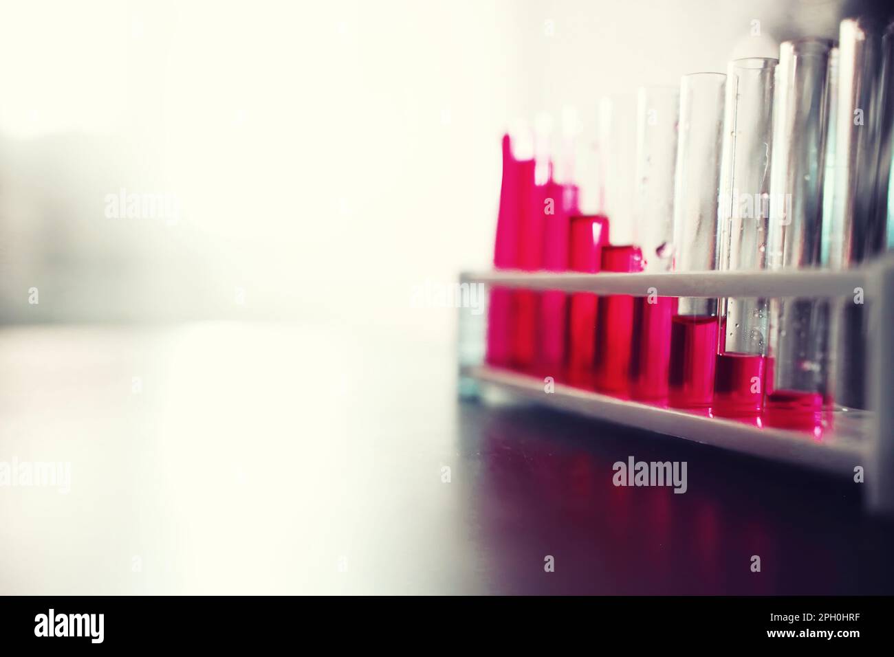 Test tube with blue liquid on laboratory table. Examination of liquid ...