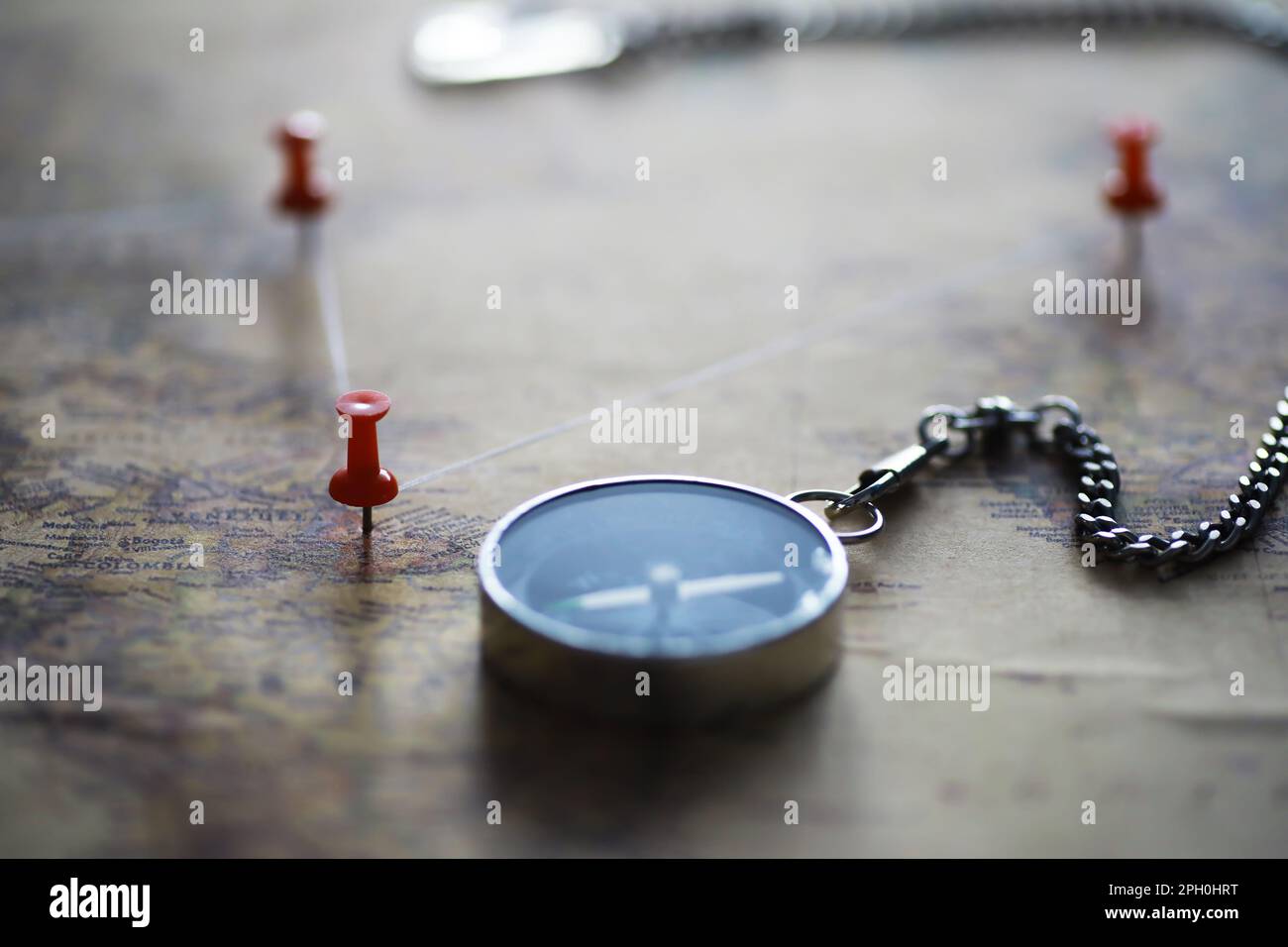 Travel concept. Map and needle with a marked place. Compass point on ...