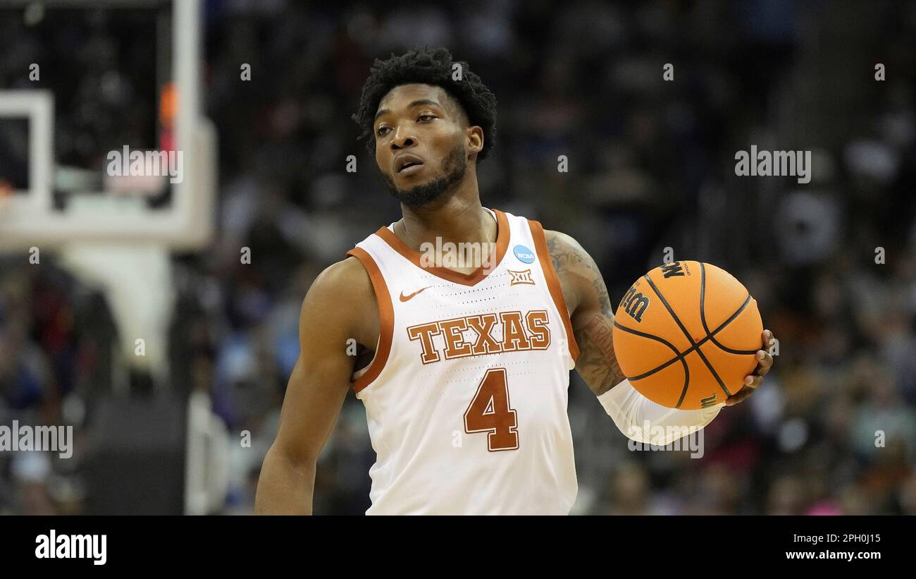 Texas guard Tyrese Hunter brings the ball down court Xavier in the ...