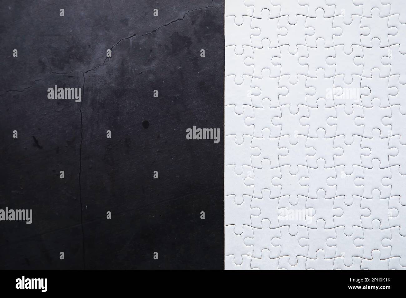 Intellectual puzzles. The puzzle empty. The hand puts together puzzle ...