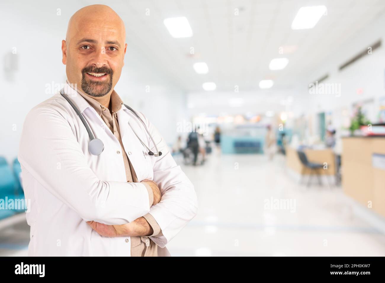 Trusted male doctor, portrait of proud middle aged trusted male doctor ...