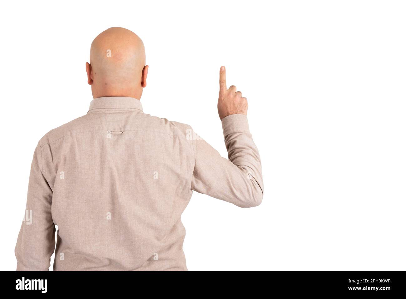 Caucasian bald man back view of pointing finger up. Pushing invisible ...