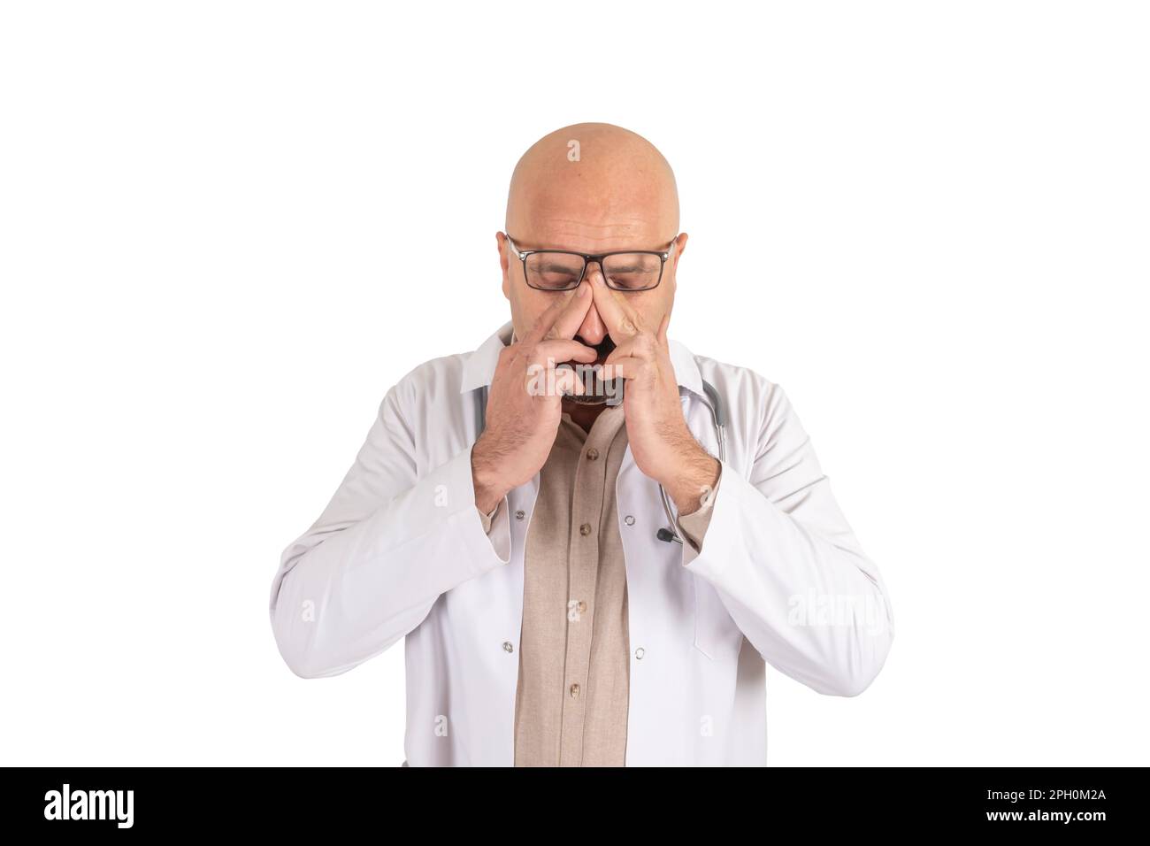 tired doctor. Wearing white coat, take off glasses, rubbing eyes ...