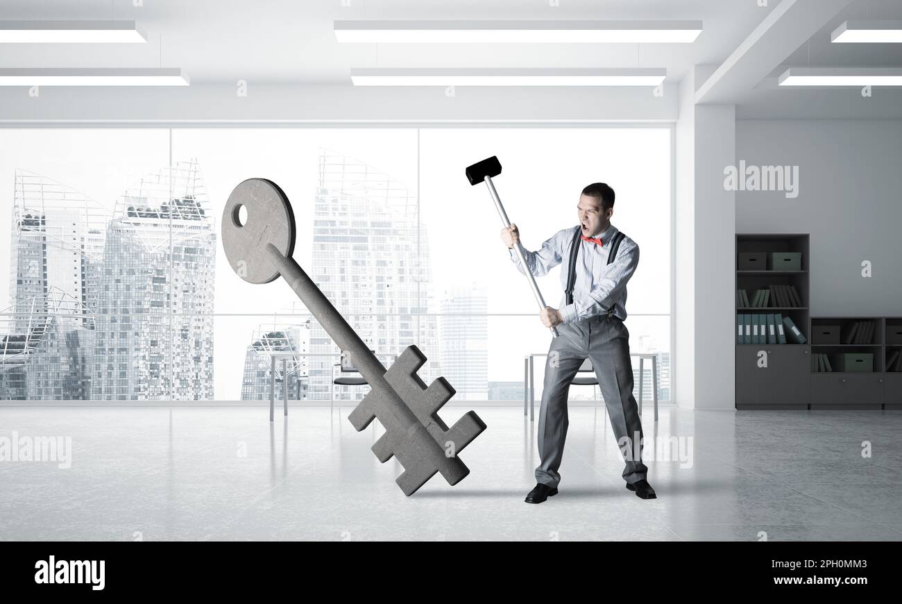 Breaking through access concept with man in crashing concrete key Stock ...