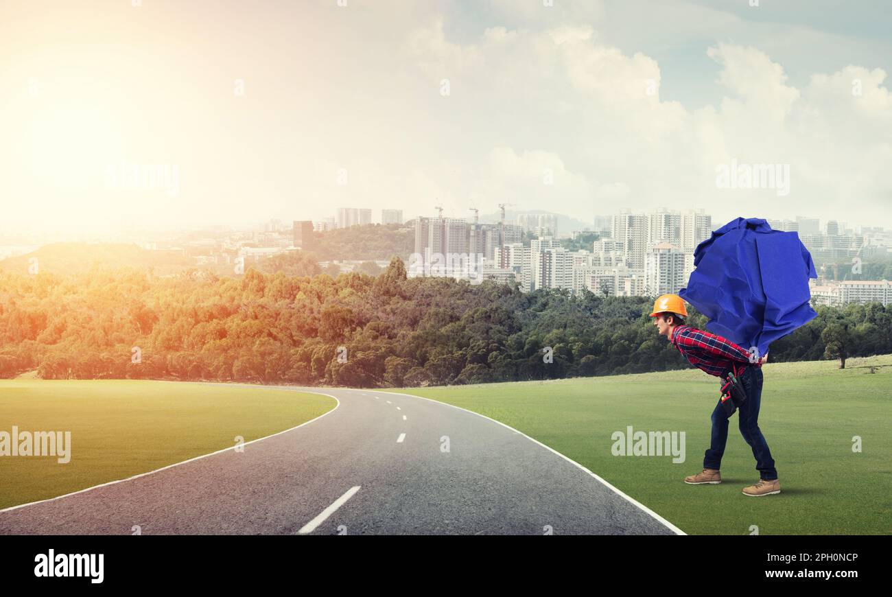Engineer man carry load Stock Photo - Alamy