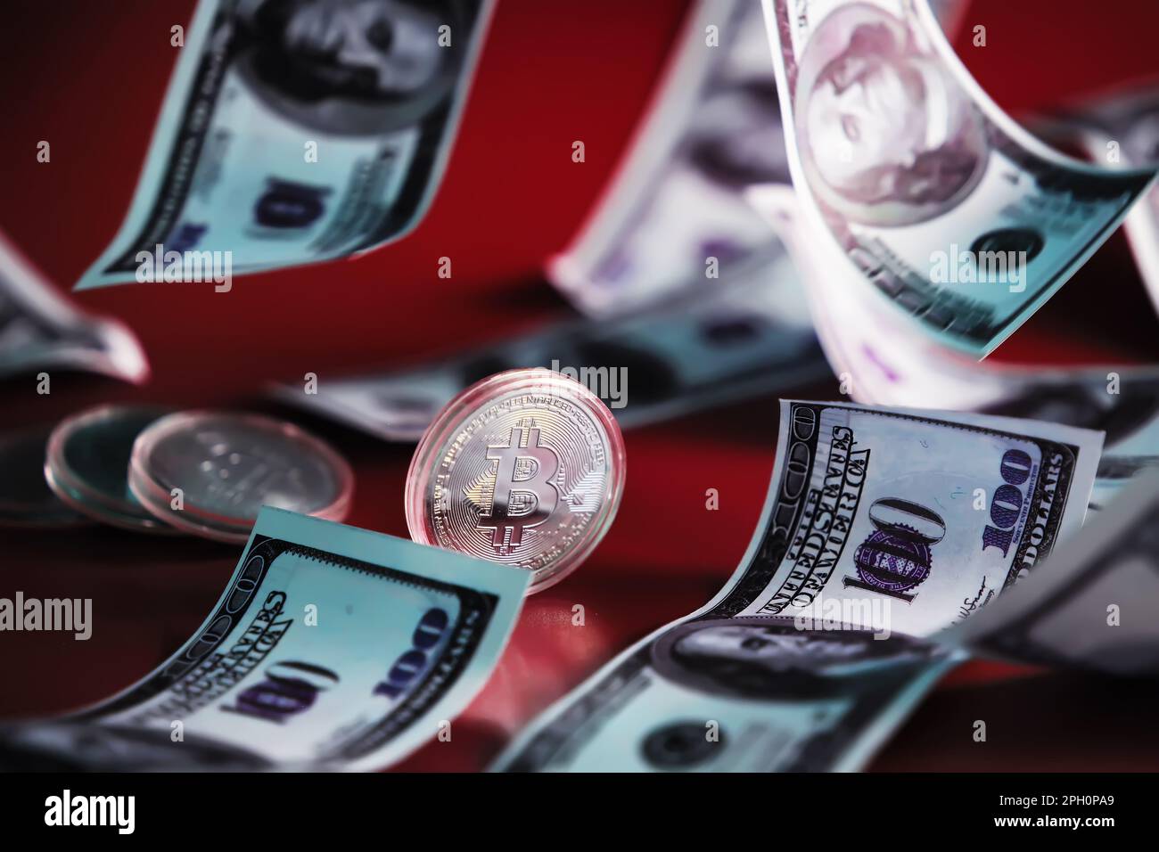 Green dollar bills on a blue background. 100 dollar bills close up. The ...